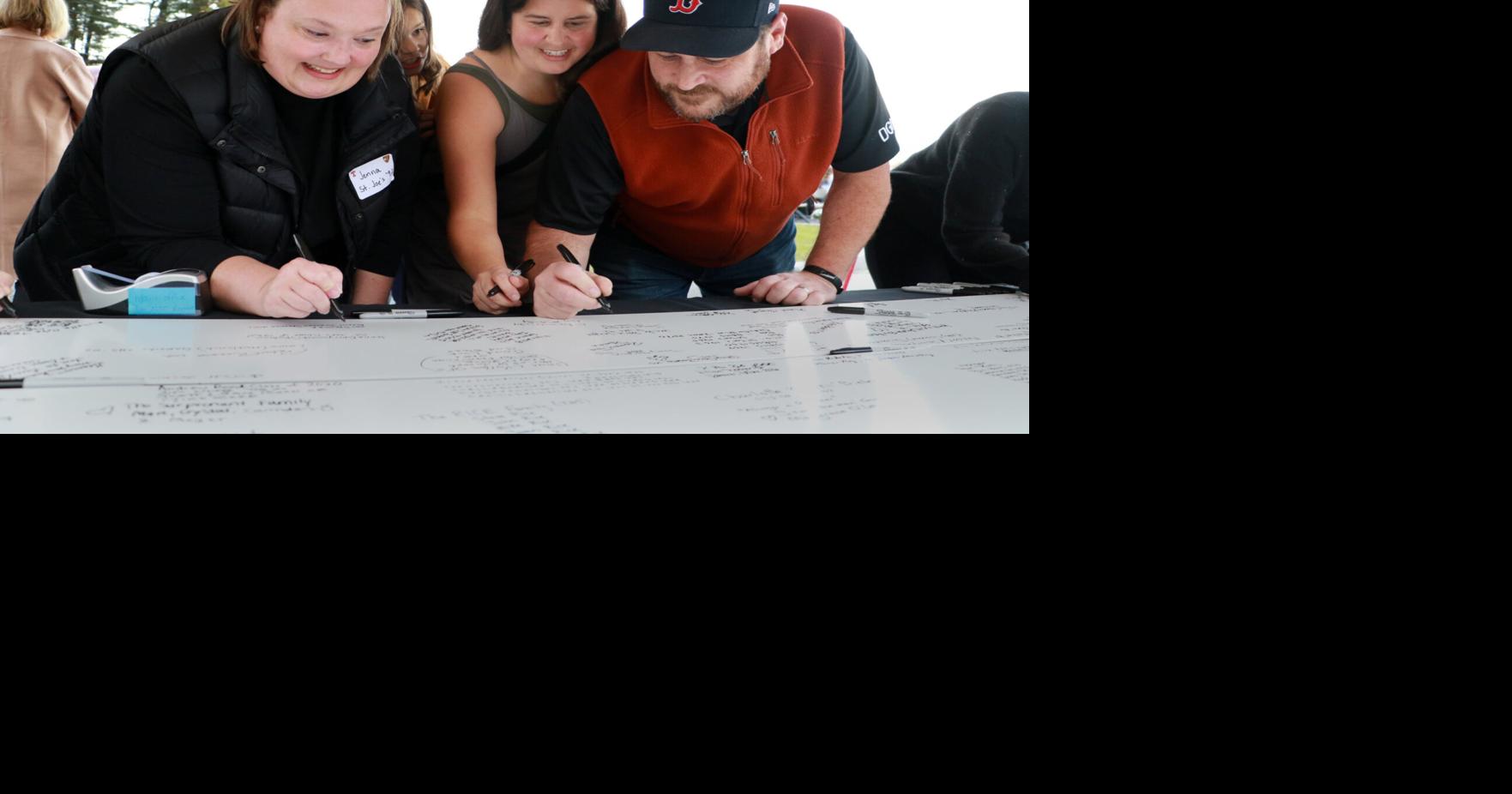 Topping off a step to uniting two schools | Education | unionleader.com