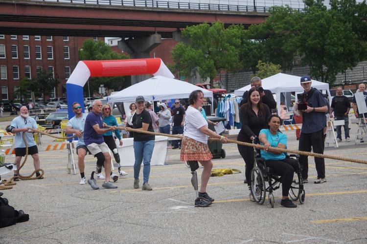 Less Leg More Heart Fire Truck Pull and Festival brings scores to Arms ...