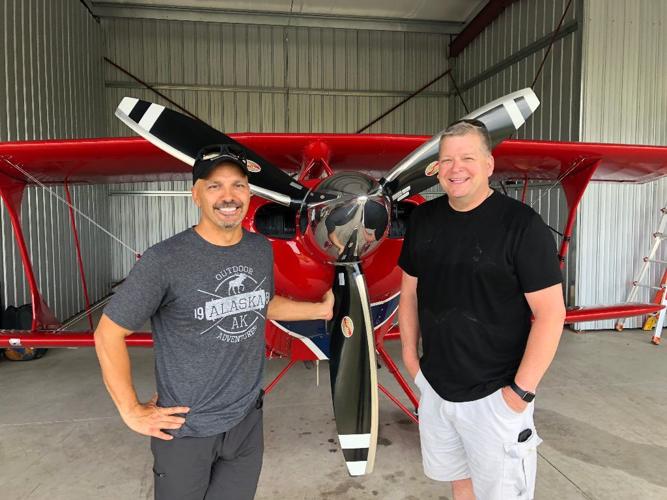 On Cloud 9: Pilot offering police free flights in stunt plane | Local ...