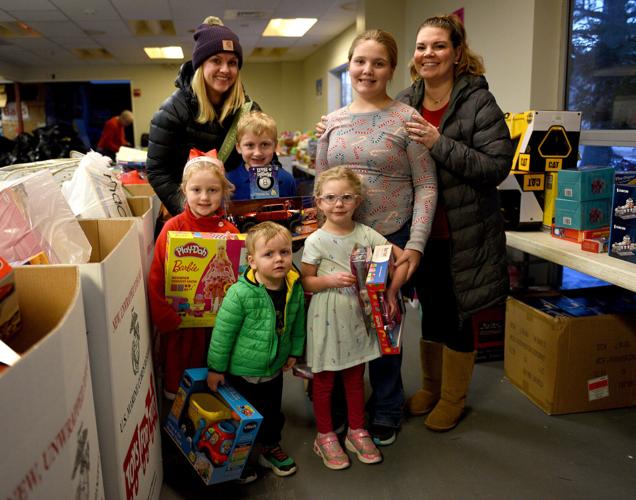 Families come out to give Santa a hand at the Salvation Army’s Toy Shop ...