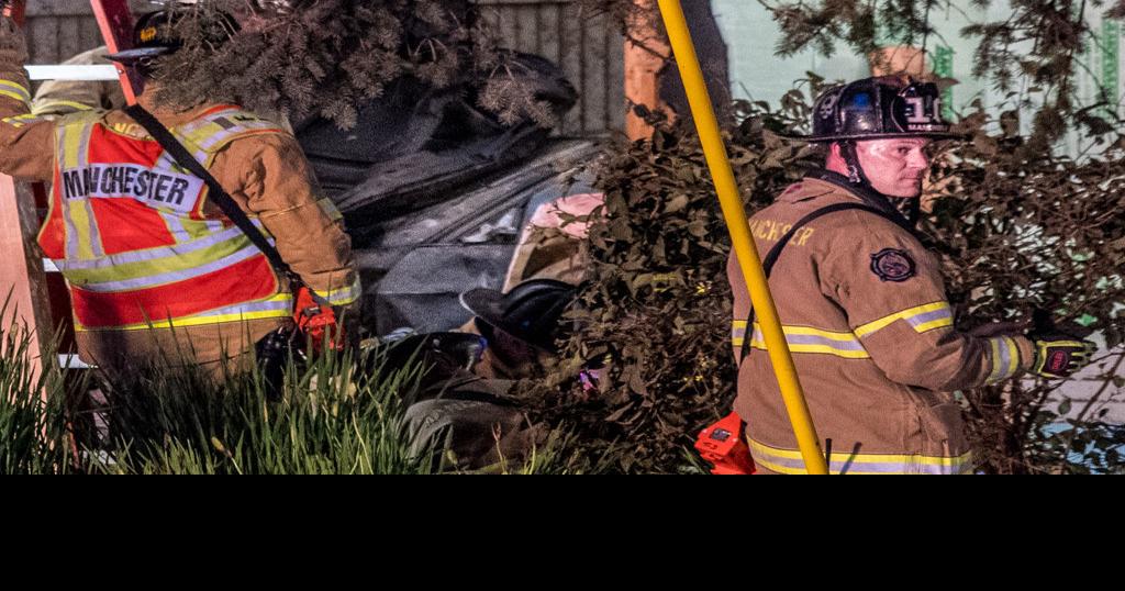 Manchester woman narrowly escapes injury after car crashes into living ...