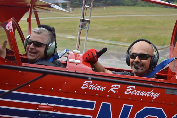 On Cloud 9: Pilot offering police free flights in stunt plane | Local ...