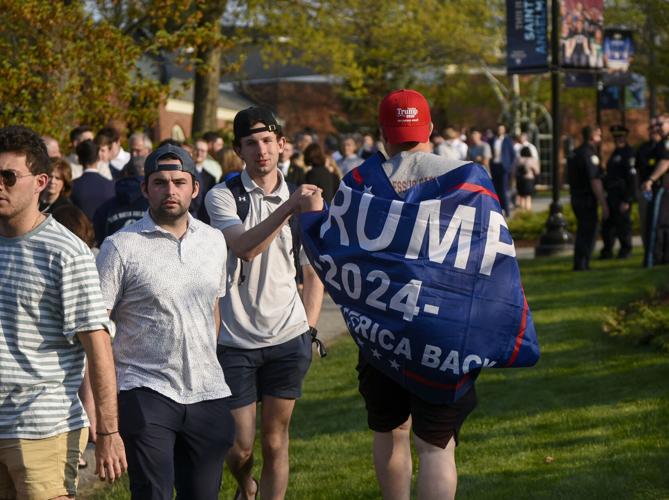 College students protest Trump's town hall with CNN on campus | Voters ...
