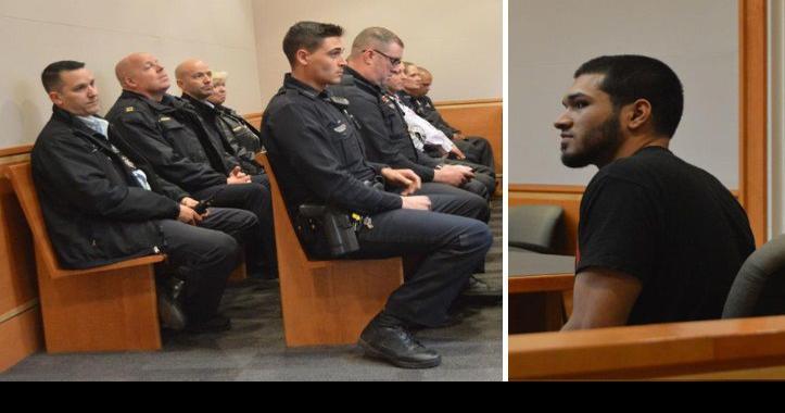 On trial for attempted murder of officer in February, Heredia signs ...