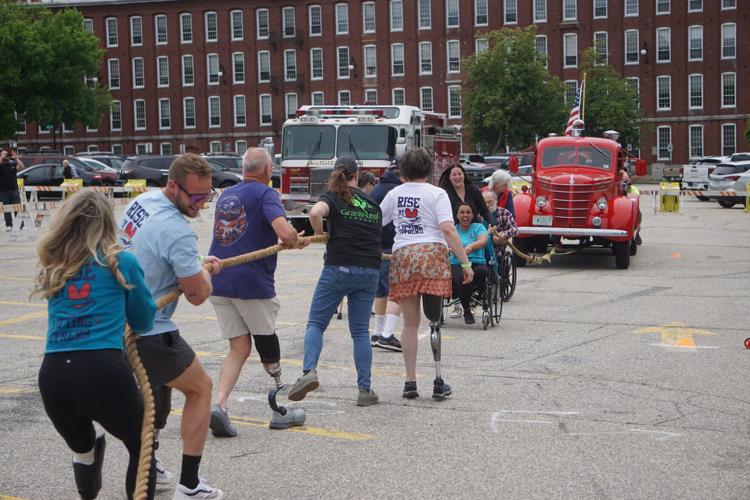 Less Leg More Heart Fire Truck Pull and Festival brings scores to Arms ...