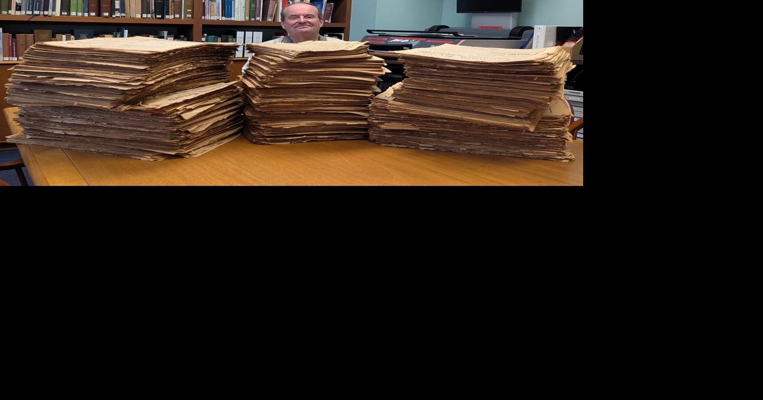 Preserving the past: Derry Public Library saves aging newspapers ...