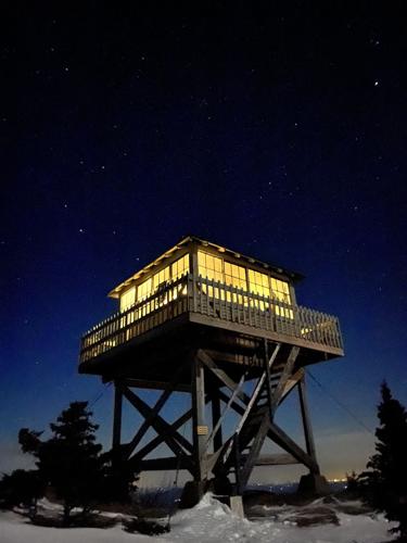 Why do hikers want to spend a freezing winter night in the Kearsarge North fire tower ...