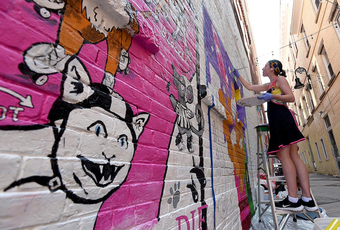 Manchester's Cat Alley reimagined by 18 artists | A&E | unionleader.com