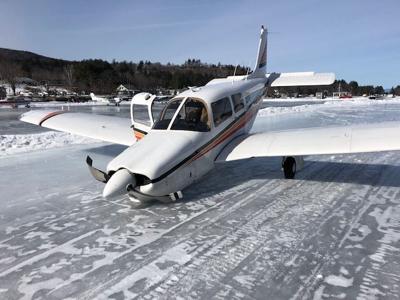 Single-engine plane slides off ice runway at Alton Bay | Public Safety ...