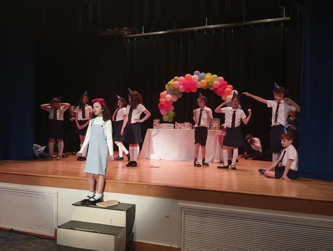 Parent volunteers develop friendships around Community's 'Matilda the ...