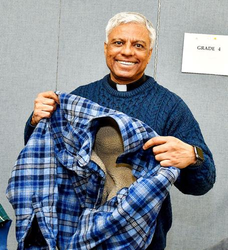 Mary, Mother of Mankind Church distributes coats and hot meals ...