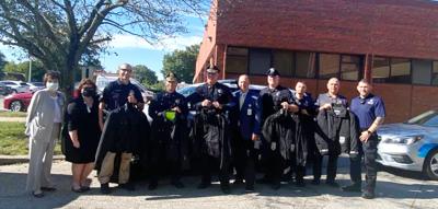 NPPD donates police jackets to Fatima security | North Providence ...