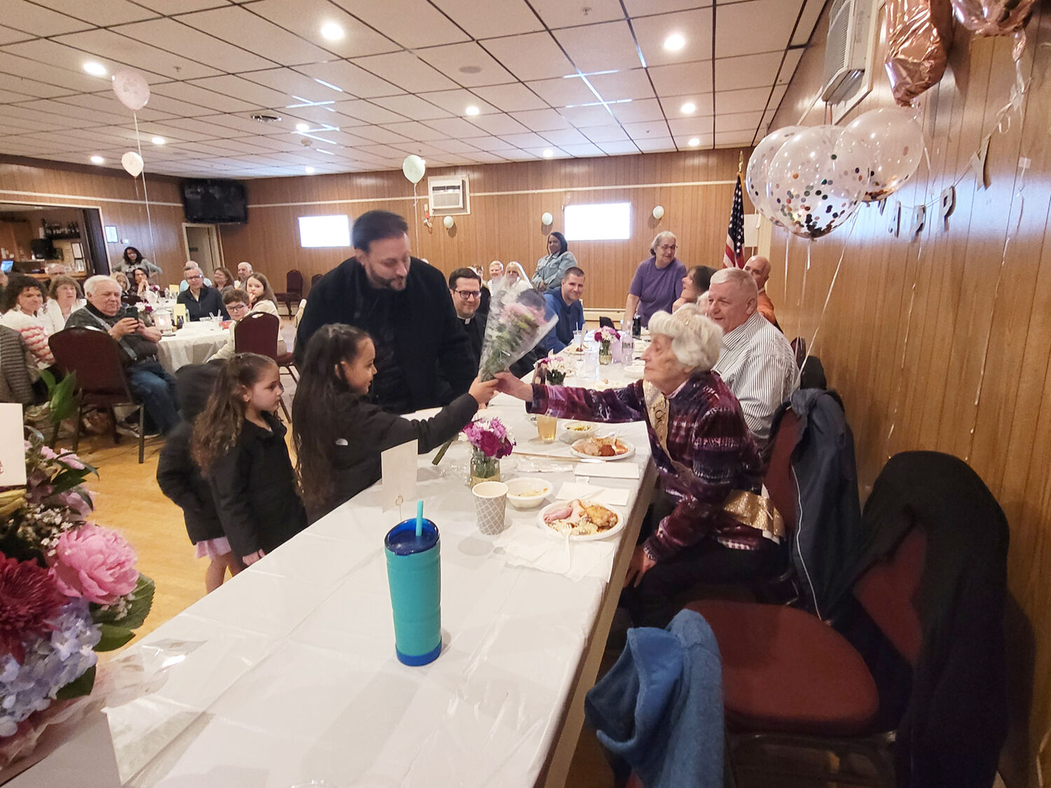Marchand rings in 100th year with family, surprise party | Pawtucket ...