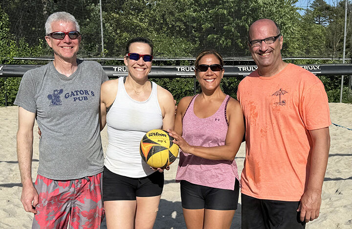 Competition heats up at midway point of Gator's Pub Summer Volleyball ...