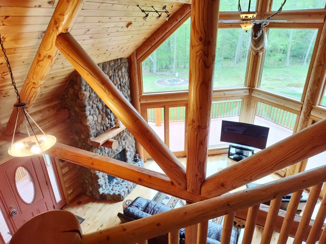 Rocky Mountain living: North Scituate log cabin is uniquely stunning ...