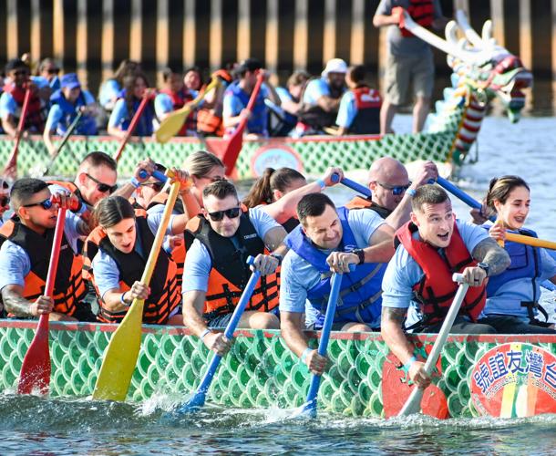Dragon Boats glide in the Pawtucket River at the Arts Festival ...