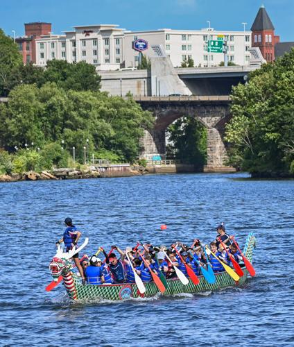 Dragon Boats glide in the Pawtucket River at the Arts Festival ...