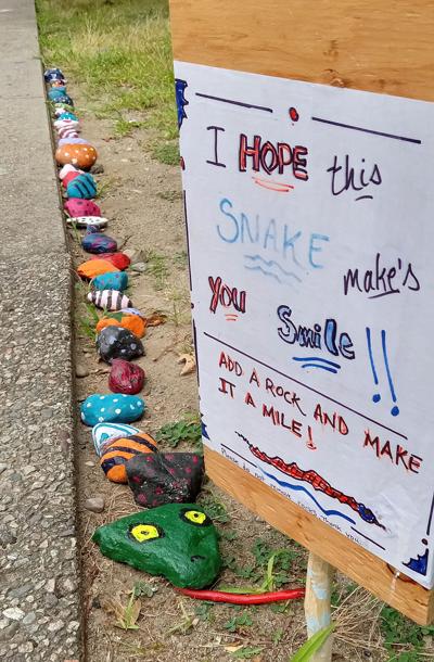 Rock snake at Pawtucket's Slater Park meant to inspire happiness | News ...
