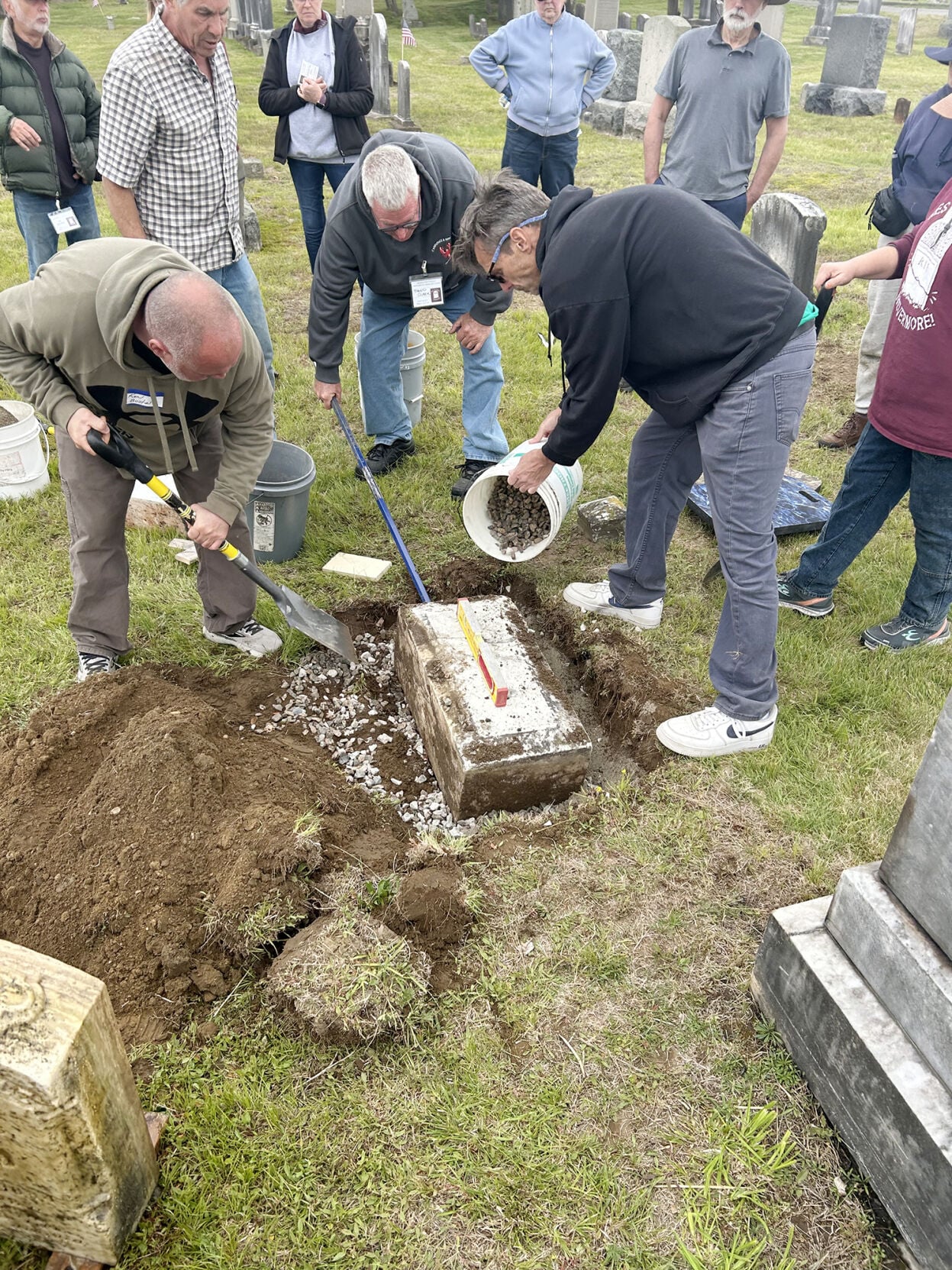 Volunteers learn gravestone restoration at Slatersville Cemetery ...