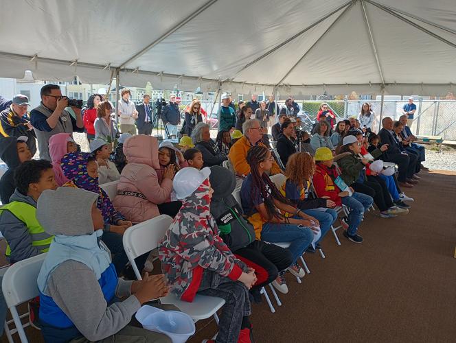 Construction of new Baldwin reaches peak with steel topping ceremony ...