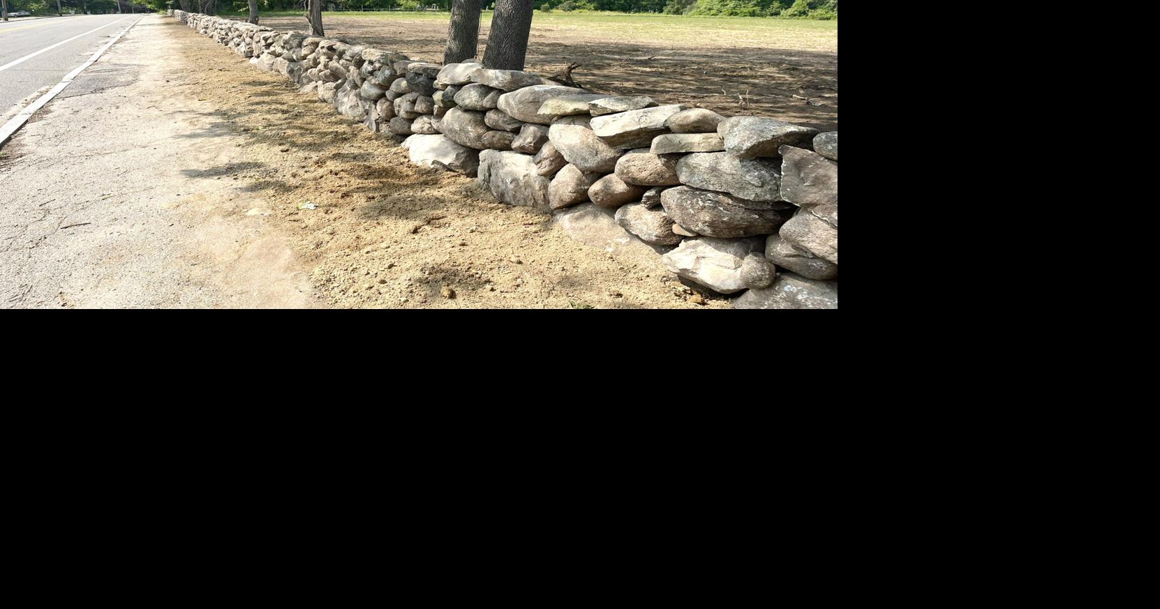New stone wall transforms section of Old River Road | News ...