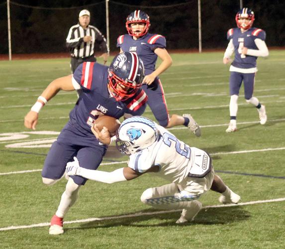 Johnston strikes through the air to rally past Lincoln football team ...