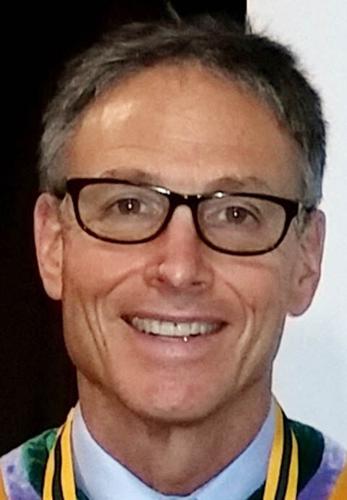 Local dentist inducted as fellow of International College of Dentists ...