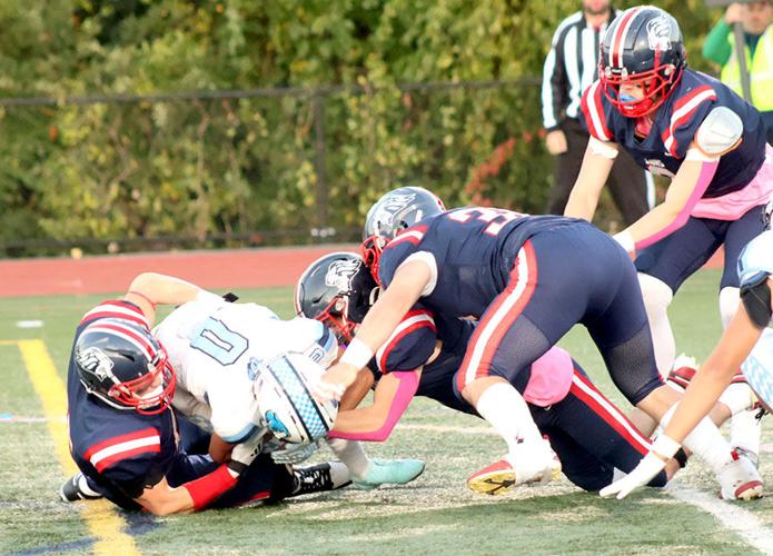 Johnston strikes through the air to rally past Lincoln football team ...