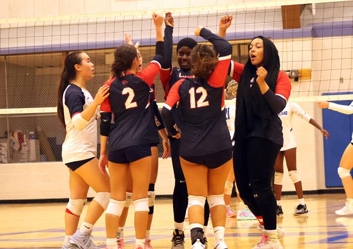 Lincoln girls' volleyball team spikes Cumberland in four sets to ...