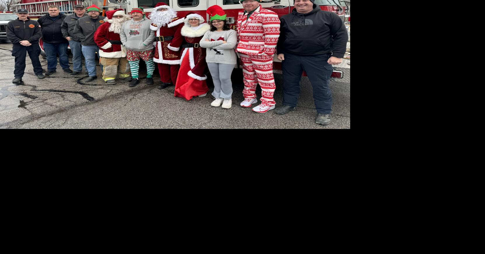 Santa and his elves make the rounds by firetruck | Community ...