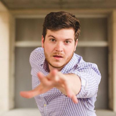 Graduate student Ryan Cashman works as a professor, comedian and ...