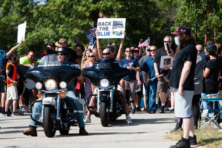 Gallery: Black Lives Matter protest counters Back the Blue rally ...