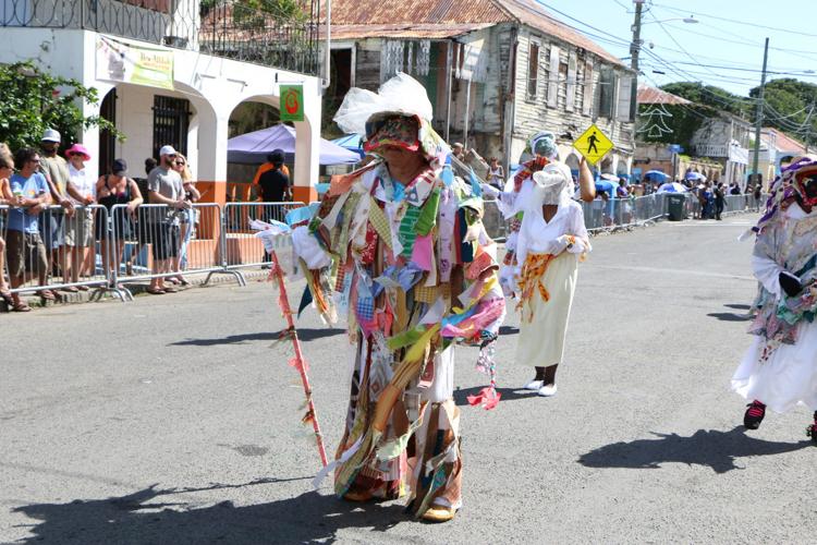 Royalty, jumbies and revelers make Adults’ Parade spectacular ...