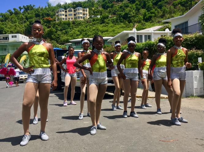 Revelers in festive mood despite parade delay | News ...