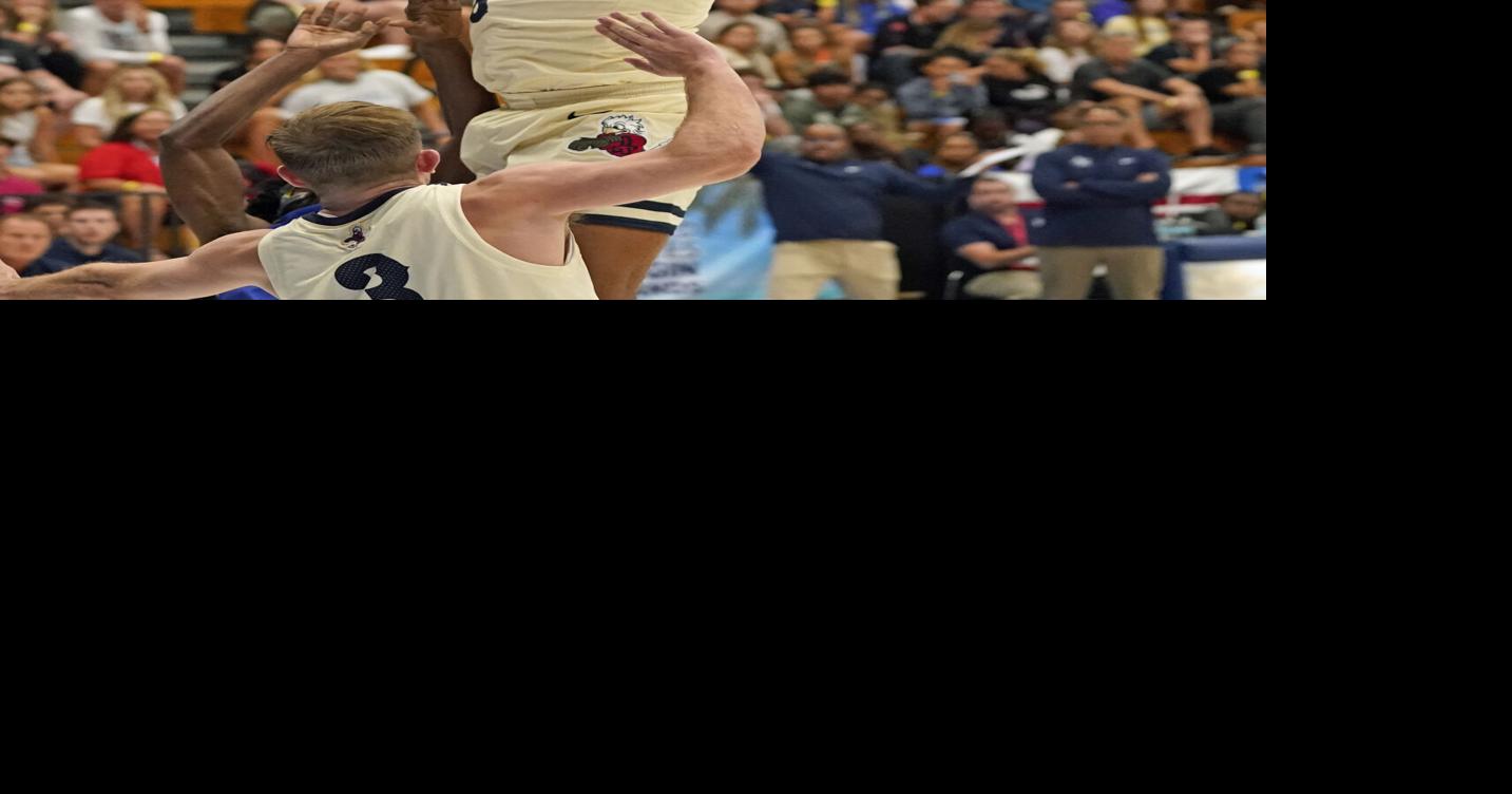 Porter, Flames hold off Cowboys to win Paradise Jam title | Sports ...