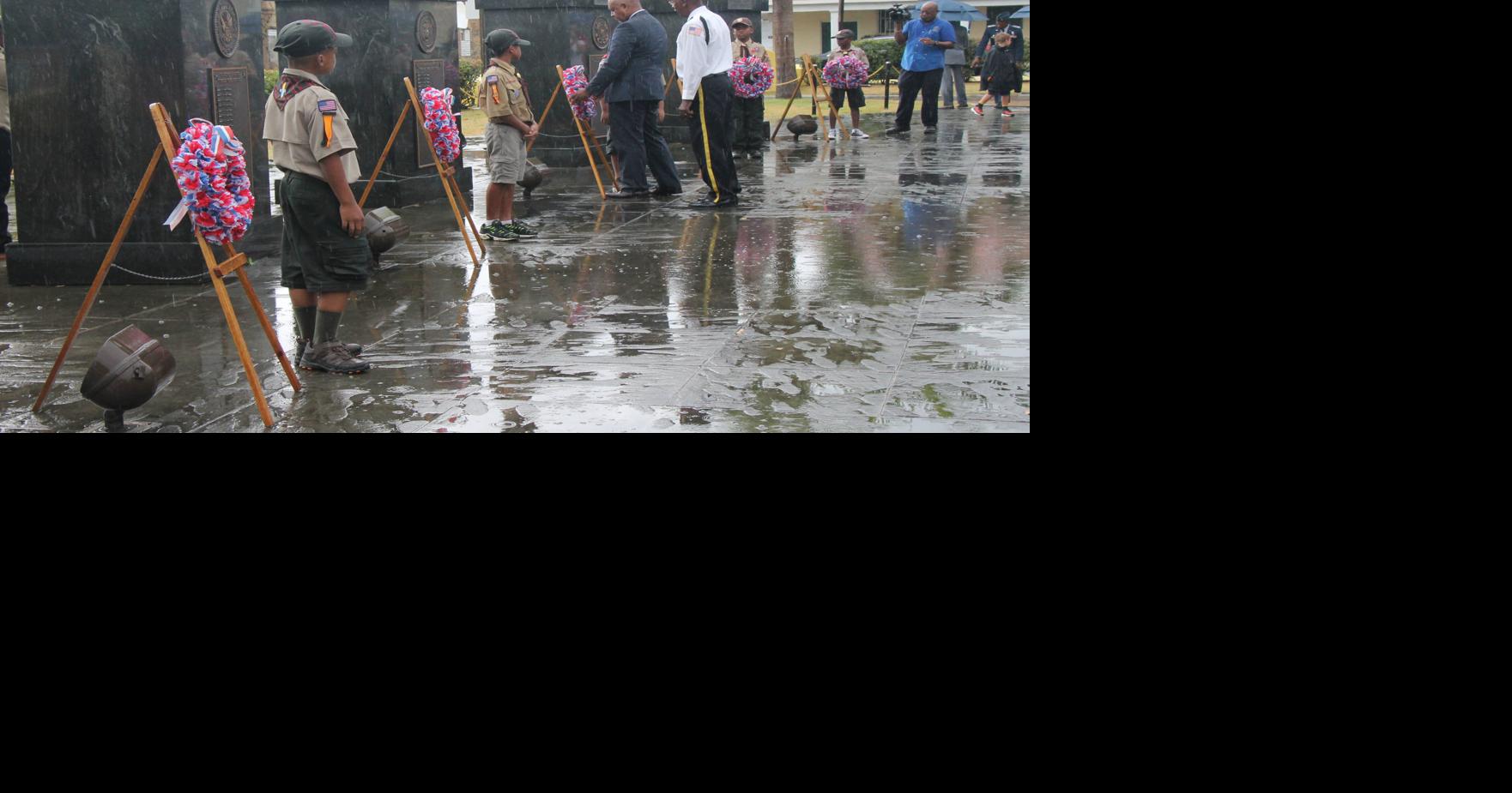 Rain adds somber note to solemn day | News | virginislandsdailynews.com