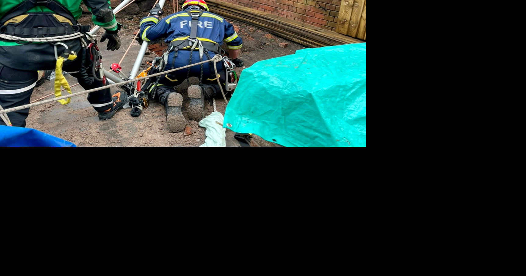 Firefighters rescue man who plunged 30-feet down street well | National ...