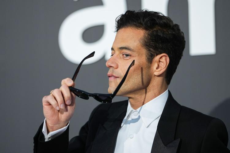 Cannes' amfAR Gala raises millions for AIDS research with sales of ...