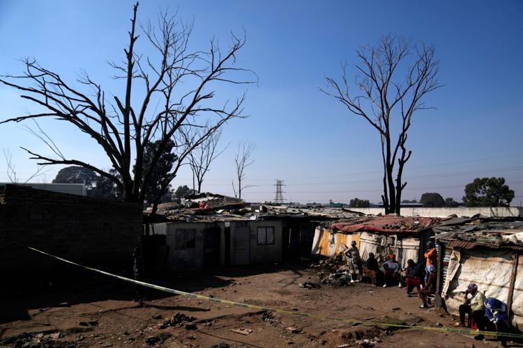 Mass shooting leaves 12 dead and at least 9 hurt in an impoverished ...