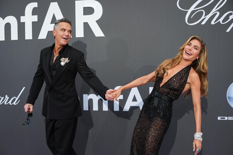 Cannes' amfAR Gala raises millions for AIDS research with sales of ...