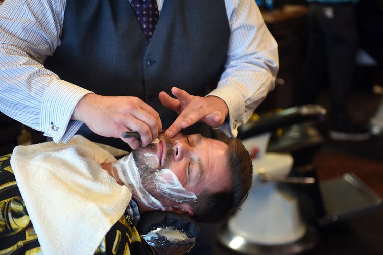 Elite Barber Shop provides haircuts with a dash of class | Features ...