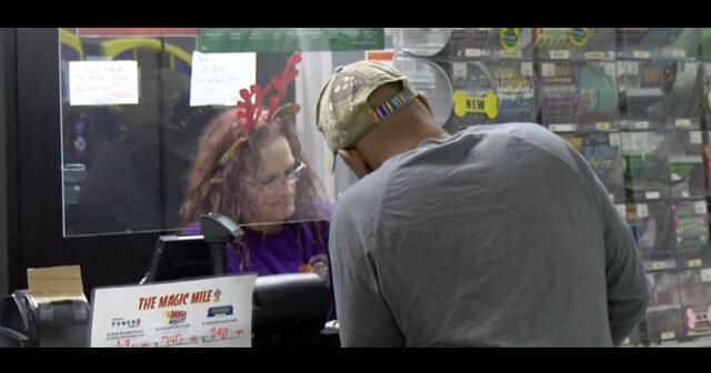 Lottery fever still strong at state-line stores as Mega Millions ...