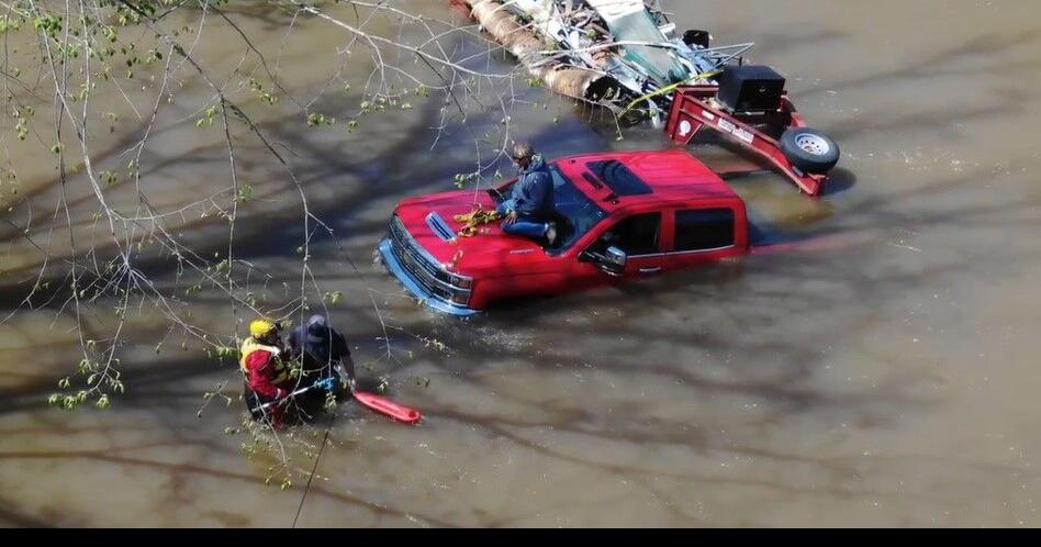 VIDEO: 2 men rescued from pickup truck caught in Lawrence County flood ...