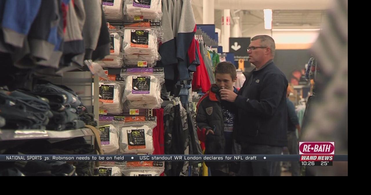 Local firefighters shop with kids for annual Shop With a Fireman effort ...