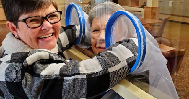 A Hugging Booth Helps Families Hold Their Loved Ones | News | wandtv.com