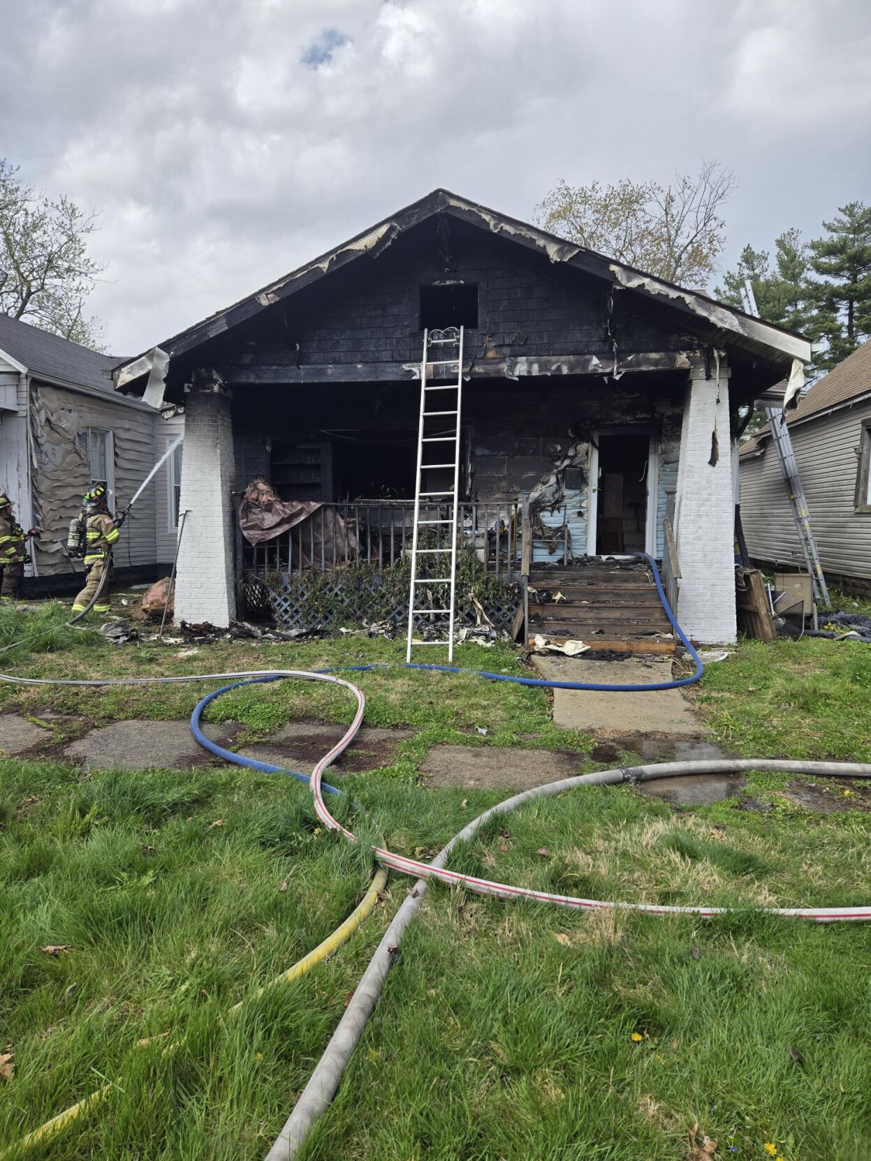 Firefighters rescue family from inside burning house in Mattoon | News ...