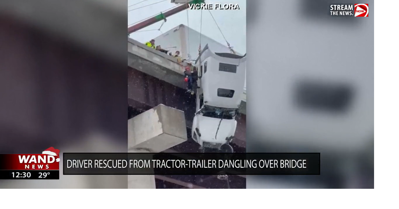 Driver rescued from semi dangling over bridge | Videos | wandtv.com