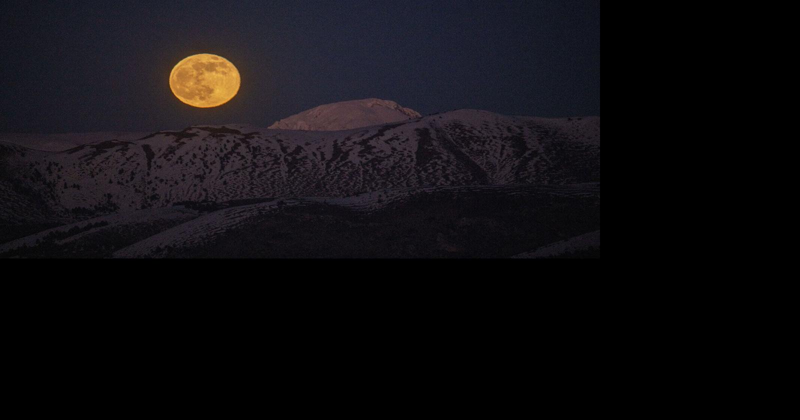 Full 'cold moon' shines bright and eclipses Mars in a rare event | News ...