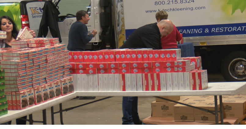 Area business holds food box drive for families in need | News | waow.com