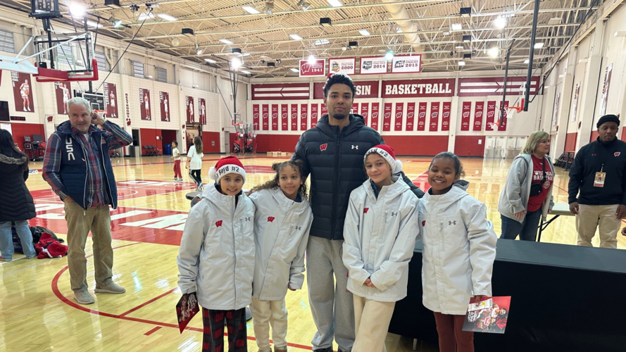 Badgers Guard Nick Boyd gives winter coats to Madison kids | News ...